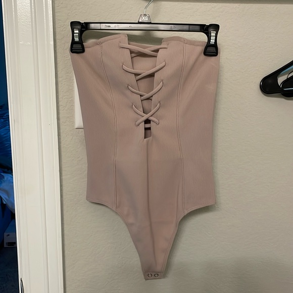 Express | Tops | Express Light Pink Crisscross Bodysuit | Poshmark